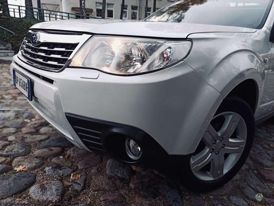 White Subaru Forester 2010 in Utena, with an engine capacity of 2.00 L and mileage of 208 thousand km for 7350 €, photo 27 on AUTOMOTO.COM.LV