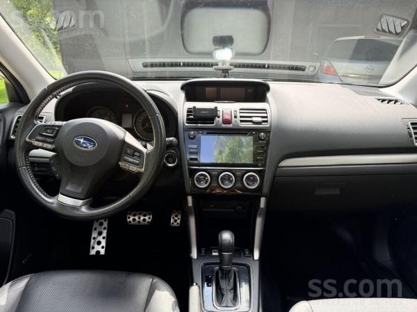 White Subaru Forester 2015 in Riga, with an engine capacity of 2.00 L and mileage of 174 thousand km for 12500 €, photo 8 on AUTOMOTO.COM.LV