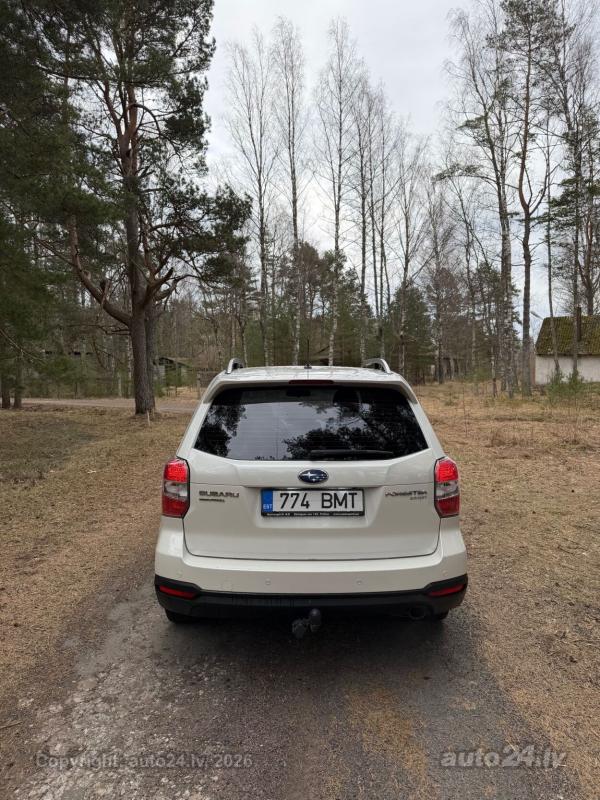White Subaru Forester 2014 in Kuressaare, with an engine capacity of 2.00 L and mileage of 200 thousand km for 9500 €, photo 6 on AUTOMOTO.COM.LV