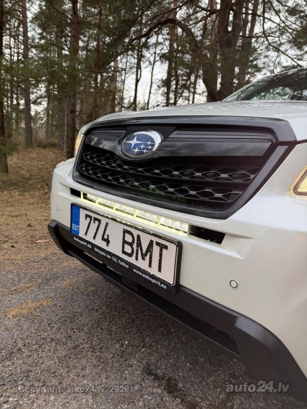 White Subaru Forester 2014 in Kuressaare, with an engine capacity of 2.00 L and mileage of 200 thousand km for 9500 €, photo 10 on AUTOMOTO.COM.LV