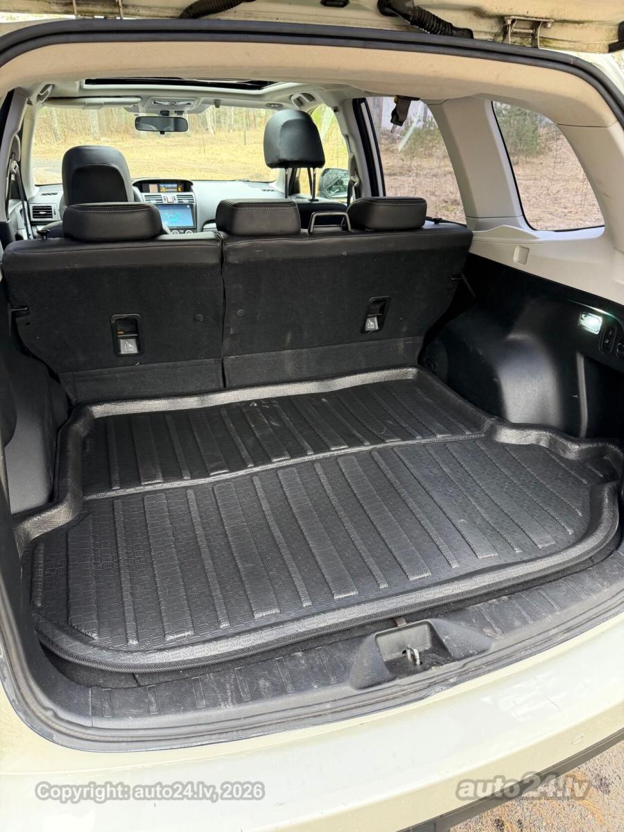 White Subaru Forester 2014 in Kuressaare, with an engine capacity of 2.00 L and mileage of 200 thousand km for 9500 €, photo 15 on AUTOMOTO.COM.LV