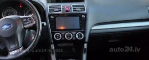 White Subaru Forester 2015 in Tartu, with an engine capacity of 2.00 L and mileage of 237 thousand km for 8700 €, photo 11 on AUTOMOTO.COM.LV