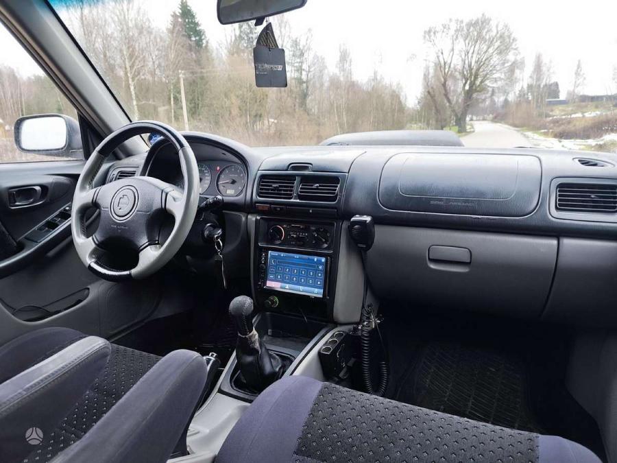 Yellow Subaru Forester 2000 in Anyksciai, with an engine capacity of 2.00 L and mileage of 290 thousand km for 3350 €, photo 5 on AUTOMOTO.COM.LV