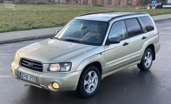 Yellow Subaru Forester 2005 in Siauliai, with an engine capacity of 2.50 L and mileage of 140 thousand km for 1750 €, photo 3 on AUTOMOTO.COM.LV