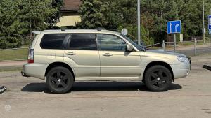 Yellow Subaru Forester 2007 in Druskininkai, with an engine capacity of 2.50 L and mileage of 328 thousand km for 4400 €, photo 5 on AUTOMOTO.COM.LV