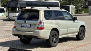 Yellow Subaru Forester 2007 in Druskininkai, with an engine capacity of 2.50 L and mileage of 328 thousand km for 4400 €, photo 6 on AUTOMOTO.COM.LV