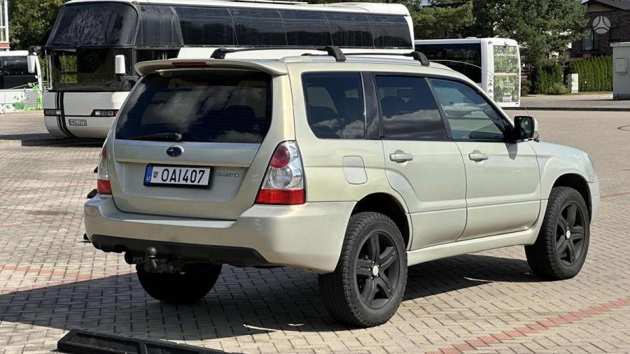 Yellow Subaru Forester 2007 in Druskininkai, with an engine capacity of 2.50 L and mileage of 328 thousand km for 4400 €, photo 6 on AUTOMOTO.COM.LV