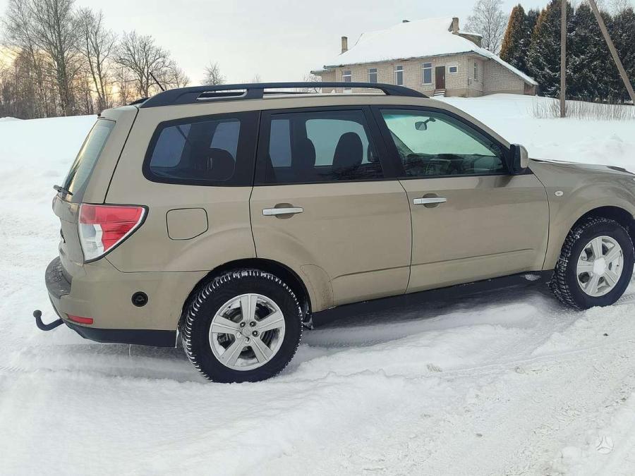 Yellow Subaru Forester 2009 in Kelme, with an engine capacity of 1.99 L and mileage of 257 thousand km for 5198 €, photo 2 on AUTOMOTO.COM.LV