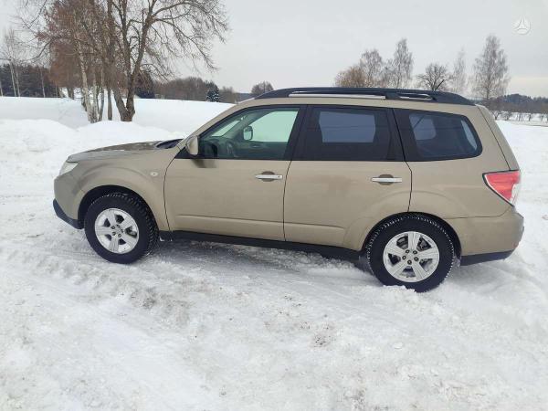 Yellow Subaru Forester 2009 in Kelme, with an engine capacity of 1.99 L and mileage of 257 thousand km for 5198 €, photo 3 on AUTOMOTO.COM.LV