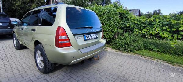 Dzeltens Subaru Forester 2003 Kauņa, ar dzinēja tilpumu 2.00 L un nobraukumu 250 tūkst. km par 3900 €, foto 4 vietnē AUTOMOTO.COM.LV