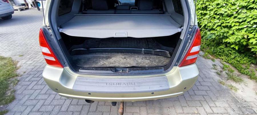 Yellow Subaru Forester 2003 in Kaunas, with an engine capacity of 2.00 L and mileage of 250 thousand km for 3900 €, photo 7 on AUTOMOTO.COM.LV