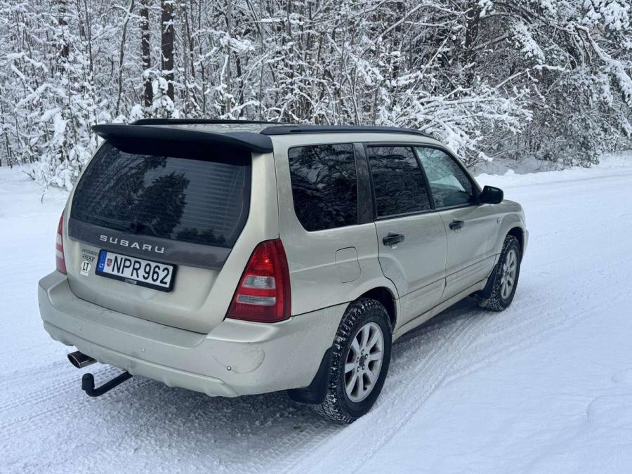 Dzeltens Subaru Forester 2004 Viļņa, ar dzinēja tilpumu 2.00 L un nobraukumu 315 tūkst. km par 2650 €, foto 3 vietnē AUTOMOTO.COM.LV