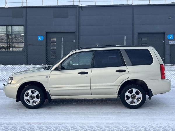 Yellow Subaru Forester 2005 in Silute, with an engine capacity of 2.00 L and mileage of 328 thousand km for 2999 €, photo 7 on AUTOMOTO.COM.LV