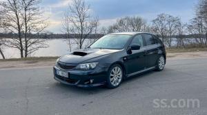 Melns Subaru Impreza 2007 Rīga, ar dzinēja tilpumu 2.50 L un nobraukumu 230 tūkst. km par 7900 €, foto  vietnē AUTOMOTO.COM.LV