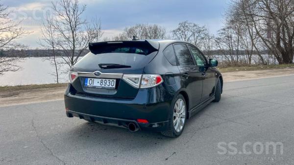 Black Subaru Impreza 2007 in Riga, with an engine capacity of 2.50 L and mileage of 230 thousand km for 7900 €, photo 4 on AUTOMOTO.COM.LV