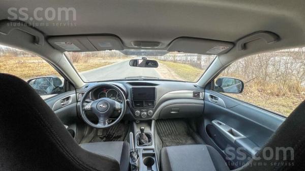Black Subaru Impreza 2007 in Riga, with an engine capacity of 2.50 L and mileage of 230 thousand km for 7900 €, photo 5 on AUTOMOTO.COM.LV