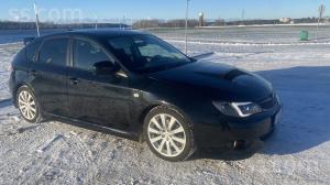 Black Subaru Impreza 2008 in Riga, with an engine capacity of 2.50 L and mileage of 229 thousand km for 10500 €, photo 2 on AUTOMOTO.COM.LV