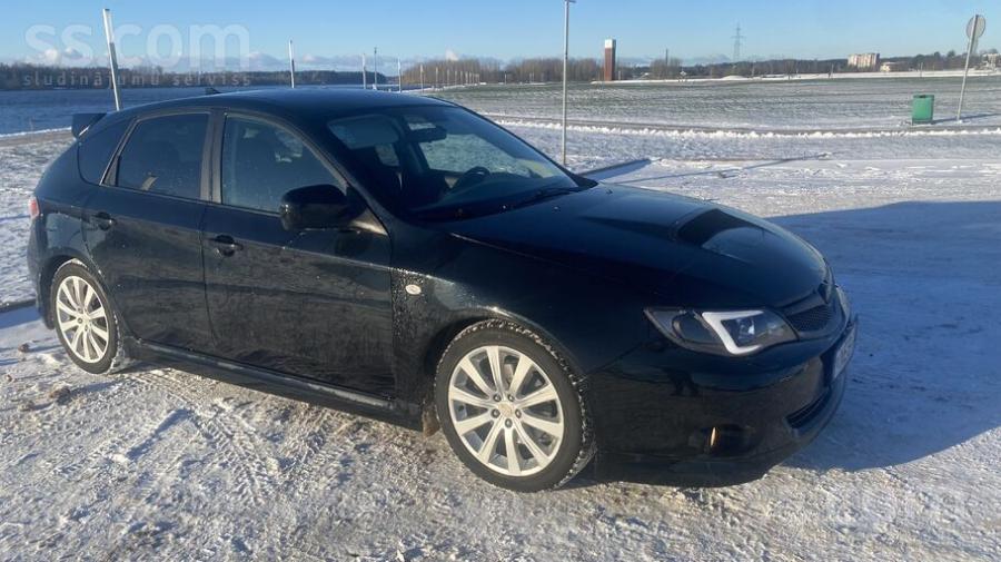 Black Subaru Impreza 2008 in Riga, with an engine capacity of 2.50 L and mileage of 229 thousand km for 10500 €, photo 2 on AUTOMOTO.COM.LV