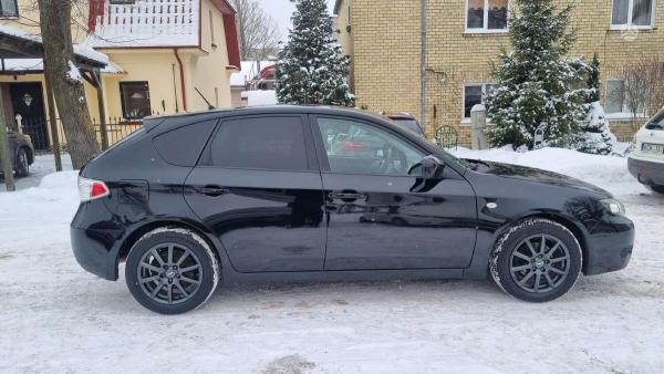 Black Subaru Impreza 2009 in Siauliai, with an engine capacity of 1.99 L and mileage of 230 thousand km for 3550 €, photo 9 on AUTOMOTO.COM.LV