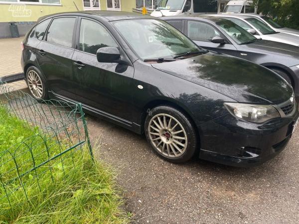 Black Subaru Impreza 2009 in Vilnius, with an engine capacity of 2.00 L and mileage of 300 thousand km for 2650 €, photo 2 on AUTOMOTO.COM.LV