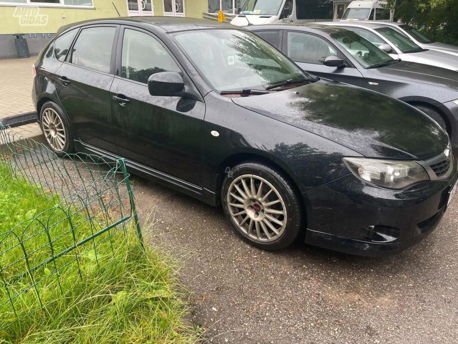 Black Subaru Impreza 2009 in Vilnius, with an engine capacity of 2.00 L and mileage of 300 thousand km for 2650 €, photo 3 on AUTOMOTO.COM.LV