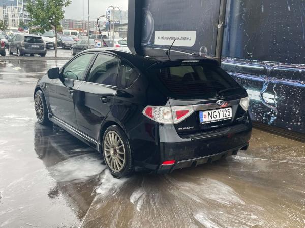 Black Subaru Impreza 2009 in Vilnius, with an engine capacity of 2.00 L and mileage of 300 thousand km for 2650 €, photo 3 on AUTOMOTO.COM.LV