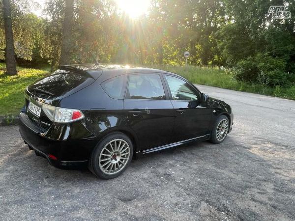 Black Subaru Impreza 2009 in Vilnius, with an engine capacity of 2.00 L and mileage of 300 thousand km for 2650 €, photo 4 on AUTOMOTO.COM.LV