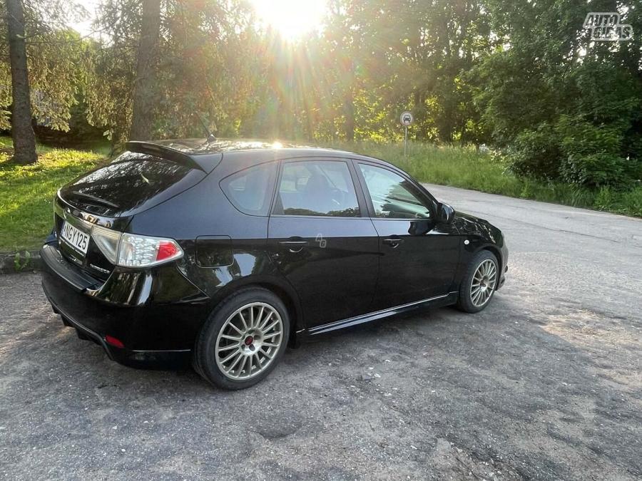 Black Subaru Impreza 2009 in Vilnius, with an engine capacity of 2.00 L and mileage of 300 thousand km for 2650 €, photo 5 on AUTOMOTO.COM.LV