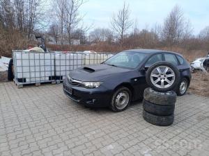 Melns Subaru Impreza 2010 Rīga, ar dzinēja tilpumu 2.00 L un nobraukumu 102 tūkst. km par 1000 €, foto  vietnē AUTOMOTO.COM.LV