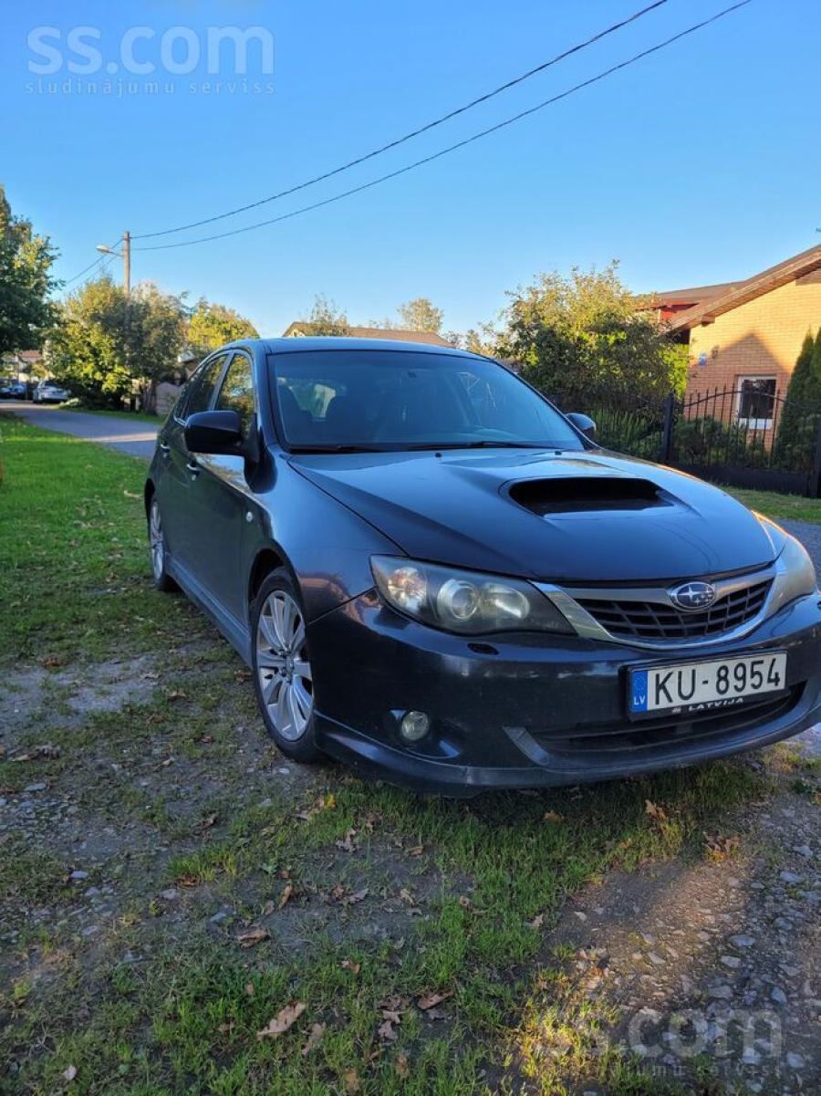 Black Subaru Impreza 2010 in Riga, with an engine capacity of 2.00 L and mileage of 236 thousand km for 3100 €, photo 1 on AUTOMOTO.COM.LV