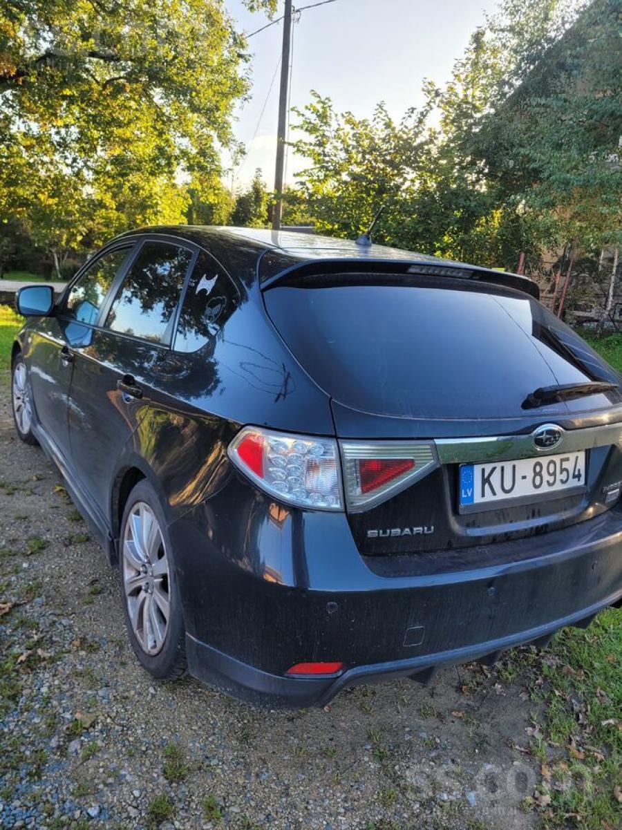 Black Subaru Impreza 2010 in Riga, with an engine capacity of 2.00 L and mileage of 236 thousand km for 3100 €, photo 3 on AUTOMOTO.COM.LV