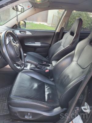 Black Subaru Impreza 2010 in Riga, with an engine capacity of 2.00 L and mileage of 236 thousand km for 3100 €, photo 4 on AUTOMOTO.COM.LV