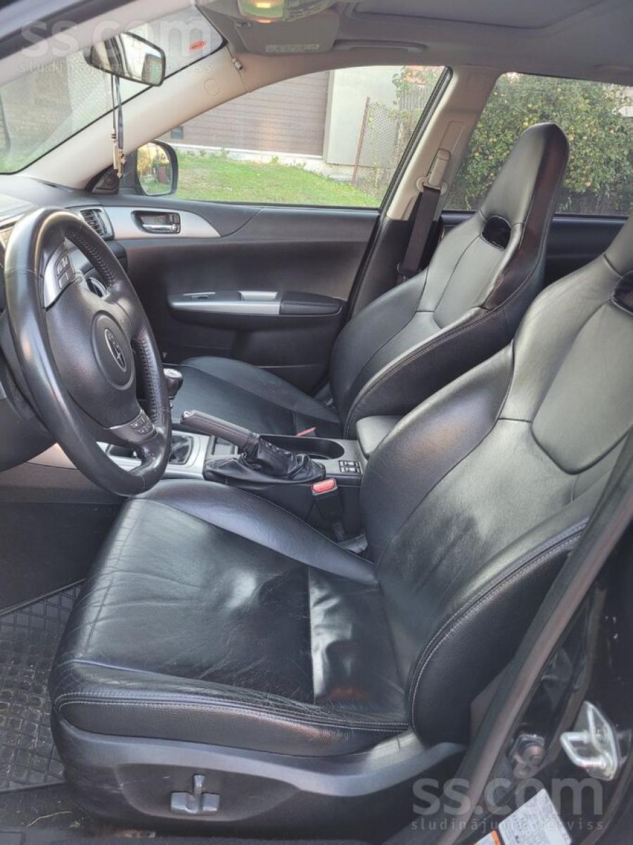 Black Subaru Impreza 2010 in Riga, with an engine capacity of 2.00 L and mileage of 236 thousand km for 3100 €, photo 4 on AUTOMOTO.COM.LV