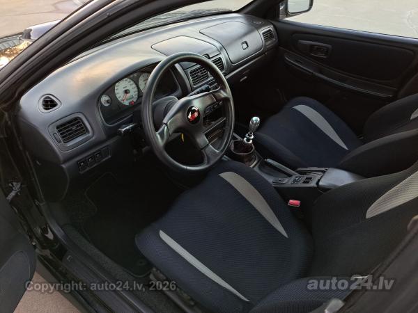 Black Subaru Impreza 1994 in Tallinn, with an engine capacity of 2.00 L and mileage of 203 thousand km for 18500 €, photo 7 on AUTOMOTO.COM.LV