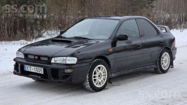 Black Subaru Impreza 1998 in Riga, with an engine capacity of 2.00 L and mileage of 295 thousand km for 7500 €, photo 1 on AUTOMOTO.COM.LV
