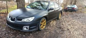 Black Subaru Impreza 2003 in Talsi, with an engine capacity of 2.00 L and mileage of 213 thousand km for 2100 €, photo  on AUTOMOTO.COM.LV