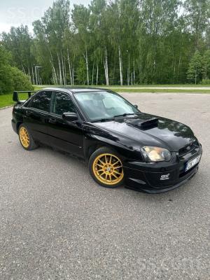 Melns Subaru Impreza 2004 Preiļi, ar dzinēja tilpumu 2.00 L un nobraukumu 280 tūkst. km par 10000 €, foto  vietnē AUTOMOTO.COM.LV