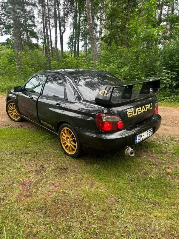 Black Subaru Impreza 2004 in Preili, with an engine capacity of 2.00 L and mileage of 281 thousand km for 8200 €, photo 4 on AUTOMOTO.COM.LV