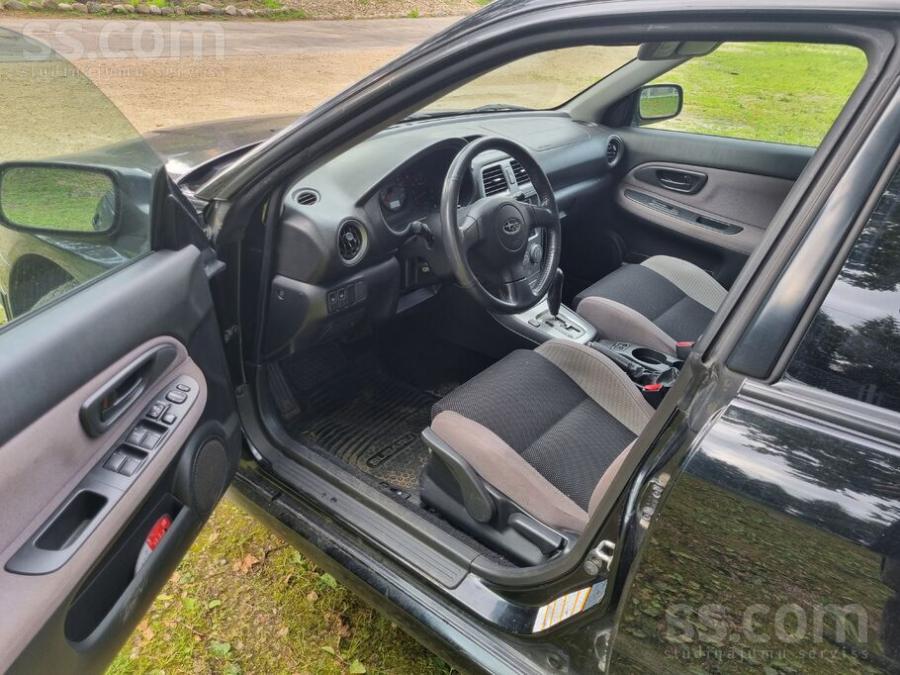 Melns Subaru Impreza 2007 Rīga, ar dzinēja tilpumu 2.00 L un nobraukumu 217 tūkst. km par 2000 €, foto 8 vietnē AUTOMOTO.COM.LV