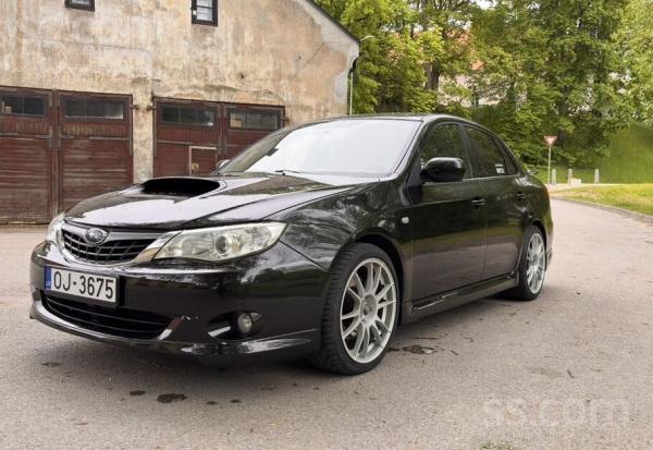 Black Subaru Impreza 2008 in Liepaja, with an engine capacity of 2.50 L and mileage of 209 thousand km for 10250 €, photo 7 on AUTOMOTO.COM.LV