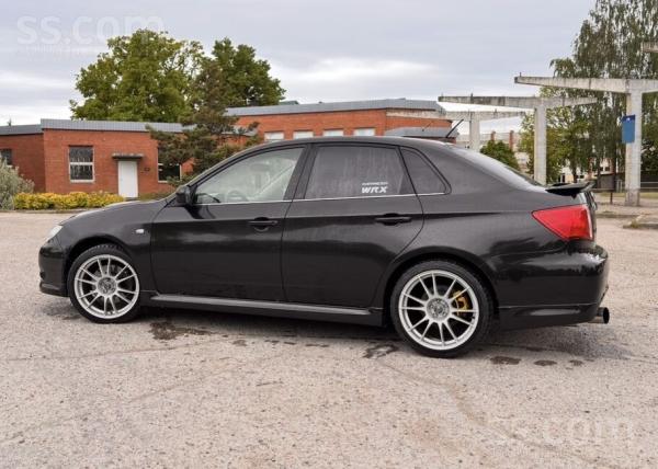Black Subaru Impreza 2008 in Liepaja, with an engine capacity of 2.50 L and mileage of 209 thousand km for 10250 €, photo 8 on AUTOMOTO.COM.LV
