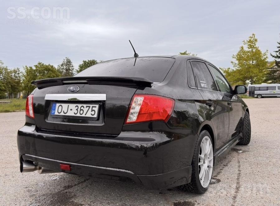 Melns Subaru Impreza 2008 Liepāja, ar dzinēja tilpumu 2.50 L un nobraukumu 209 tūkst. km par 10250 €, foto 11 vietnē AUTOMOTO.COM.LV