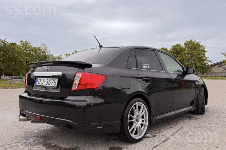 Melns Subaru Impreza 2008 Liepāja, ar dzinēja tilpumu 2.50 L un nobraukumu 209 tūkst. km par 10250 €, foto 12 vietnē AUTOMOTO.COM.LV
