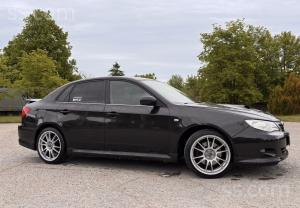 Melns Subaru Impreza 2008 Liepāja, ar dzinēja tilpumu 2.50 L un nobraukumu 209 tūkst. km par 10250 €, foto 23 vietnē AUTOMOTO.COM.LV
