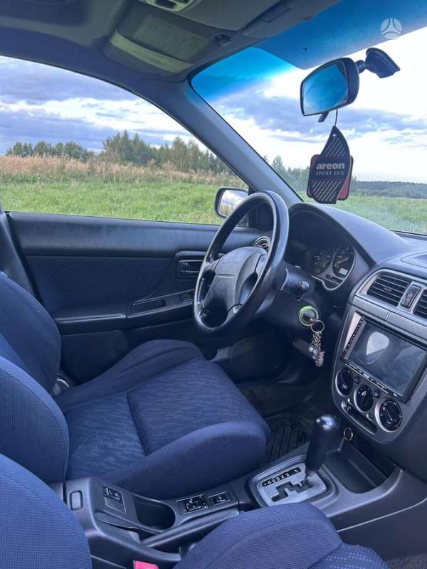 Black Subaru Impreza 2002 in Vilnius, with an engine capacity of 1.99 L and mileage of 335 thousand km for 800 €, photo 5 on AUTOMOTO.COM.LV