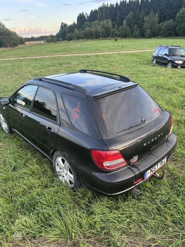 Black Subaru Impreza 2002 in Vilnius, with an engine capacity of 1.99 L and mileage of 335 thousand km for 800 €, photo 10 on AUTOMOTO.COM.LV