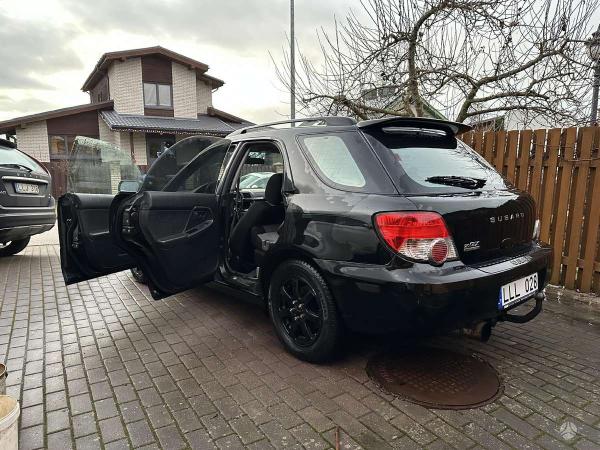 Black Subaru Impreza 2003 in Vilnius, with an engine capacity of 2.00 L and mileage of 258 thousand km for 1300 €, photo 5 on AUTOMOTO.COM.LV