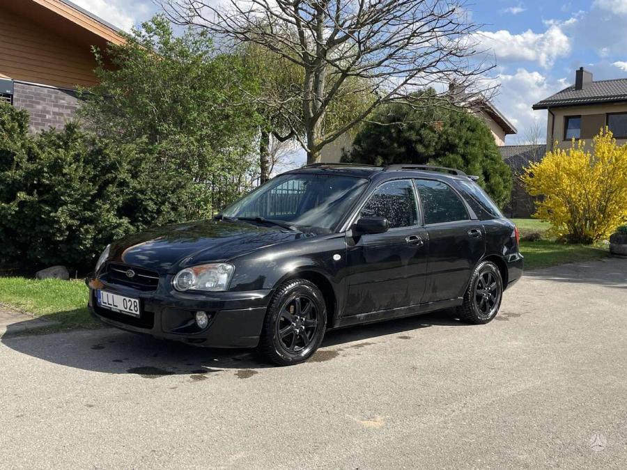 Black Subaru Impreza 2003 in Vilnius, with an engine capacity of 2.00 L and mileage of 258 thousand km for 1300 €, photo 7 on AUTOMOTO.COM.LV