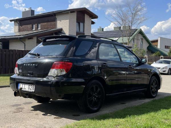 Black Subaru Impreza 2003 in Vilnius, with an engine capacity of 2.00 L and mileage of 258 thousand km for 1300 €, photo 8 on AUTOMOTO.COM.LV