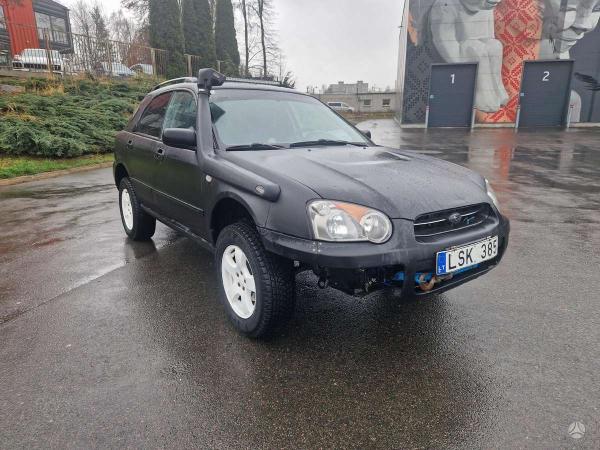 Black Subaru Impreza 2004 in Kaunas, with an engine capacity of 2.00 L and mileage of 138 thousand km for 3450 €, photo 3 on AUTOMOTO.COM.LV